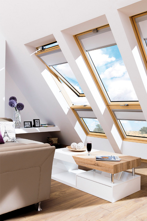 Innovative, large roof window in which the open sashes create a balcony ...